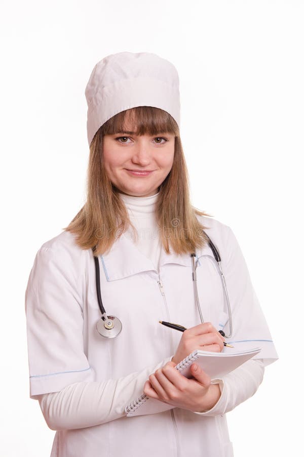Medical Officer in a White Coat Writes in a Notebook Information Stock ...