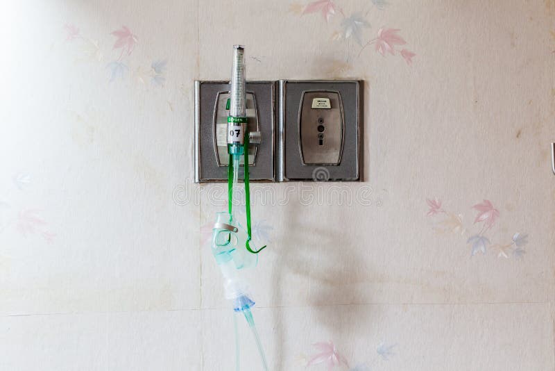 Medical Oxygen Mask and Valve Setting on Wall Stock Photo - Image of ...