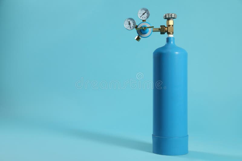 Medical Oxygen Tank on Light Blue Background. Space for Text Stock ...