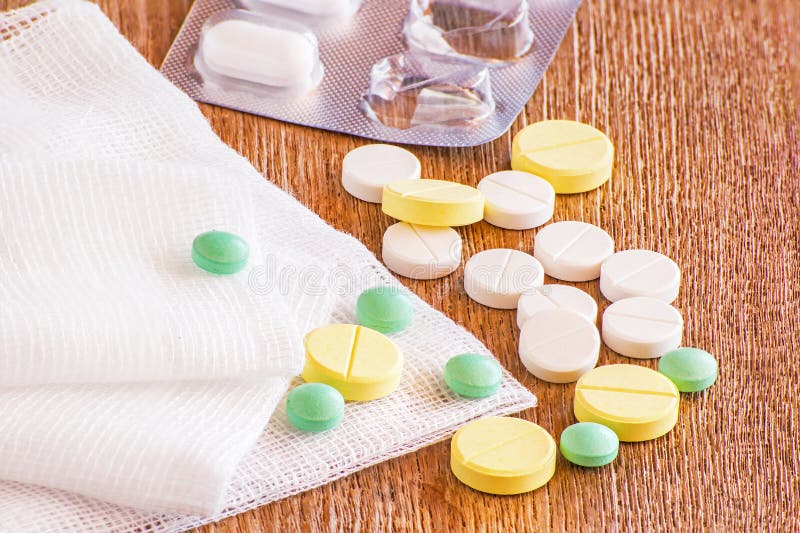 Medical Pill on Wooden Table. Stock Image - Image of capsule, illness ...