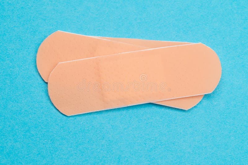 Medical Plaster on a Blue Background Stock Photo - Image of medicine ...