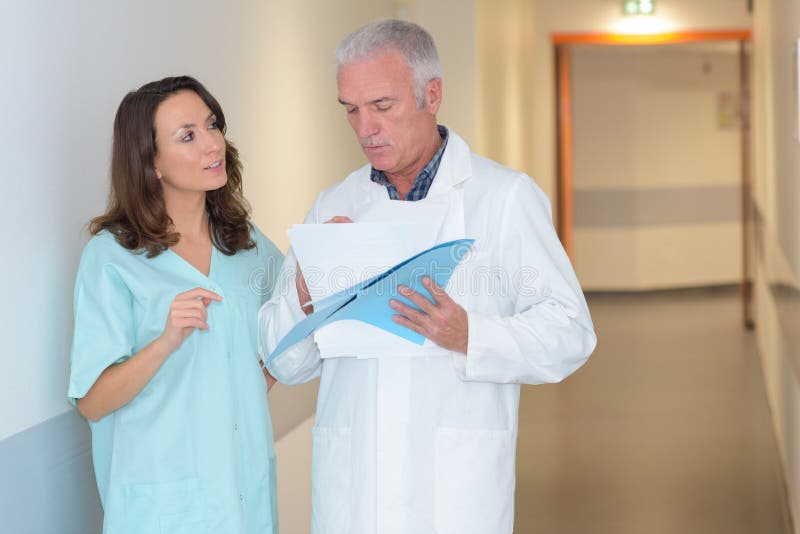 Medical Practitioner and Assistant Stock Image - Image of health ...