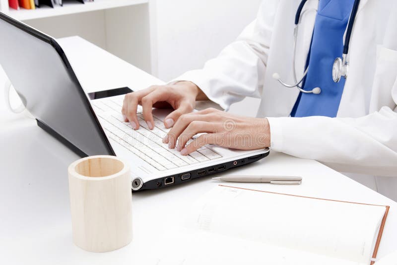 Medical Professional Typing on Laptop Stock Image - Image of laboratory ...