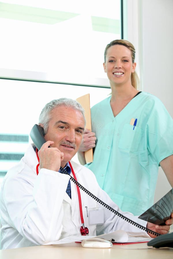 Medical professionals stock photo. Image of labcoat, cord - 30565544