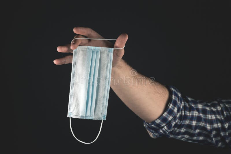 Medical Protective Mask in a Hand on Stock Image - Image of worker ...