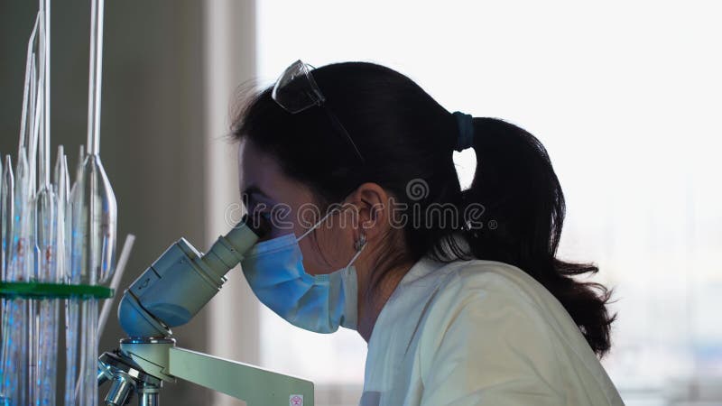 Medical Research Scientist Looking Microscope in Medical Science ...