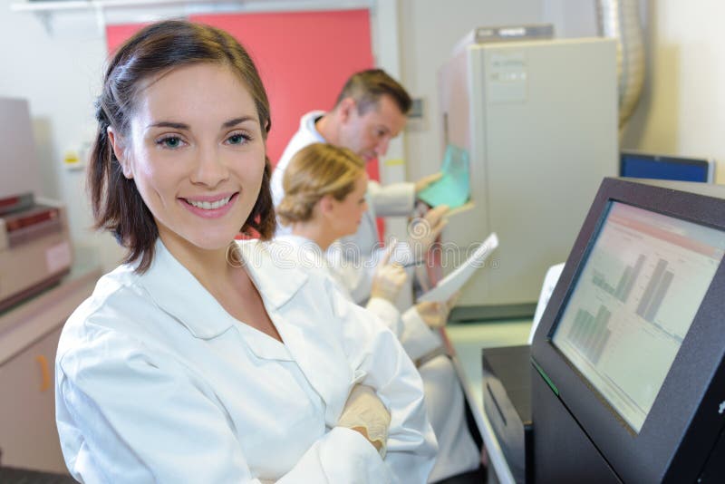 Medical Scientists Using Digital Machinery at Laboratory Stock Photo ...