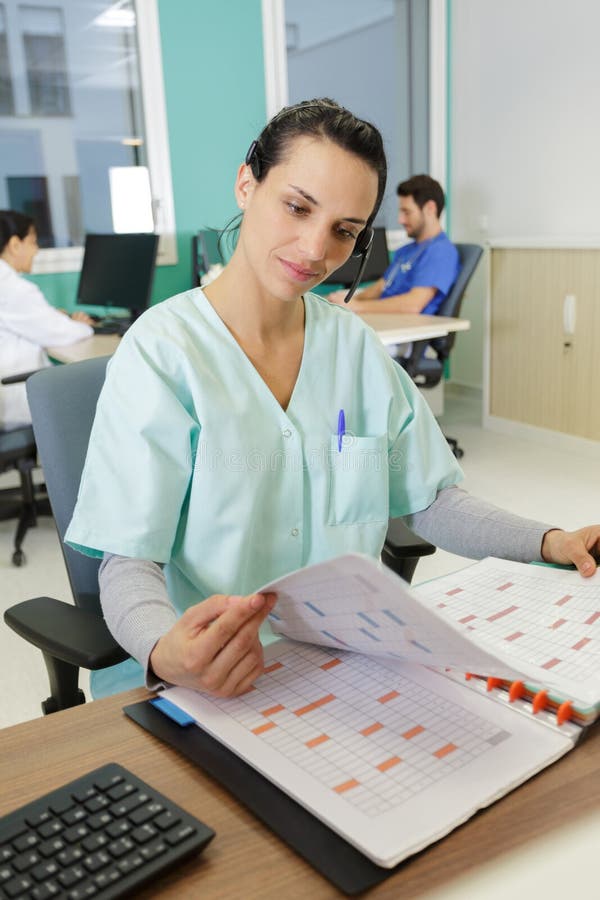 Medical Secretary Making an Appointment by Phone Stock Image - Image of ...