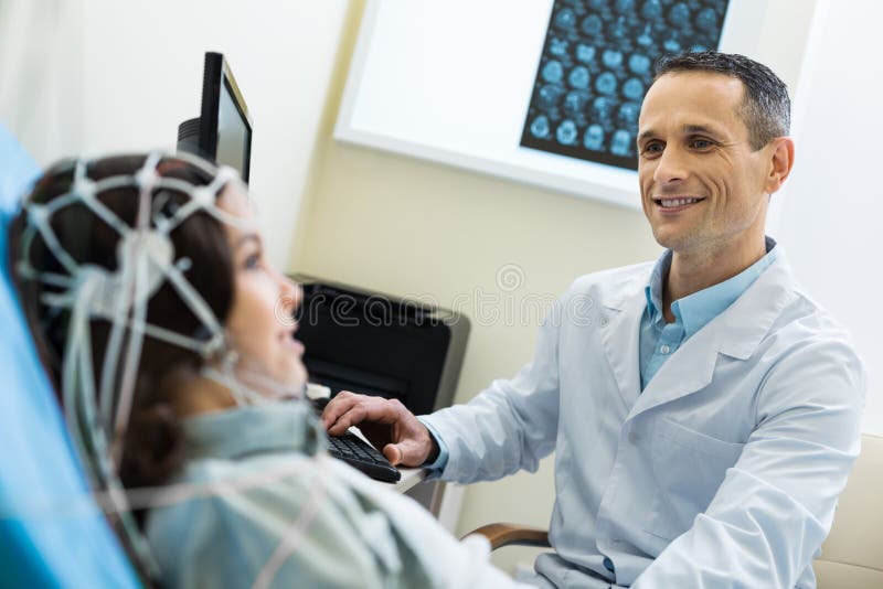 Medical Specialist Recording Electroencephalographic Waves of Patients ...