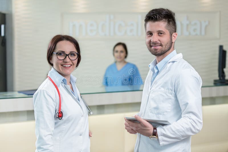 Medical Staff Having Discussion in Modern Hospital Corridor Stock Photo ...