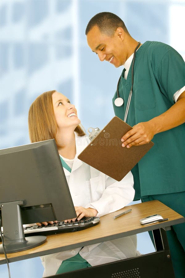 Happy Medical Staff Working Together Stock Image - Image of light ...