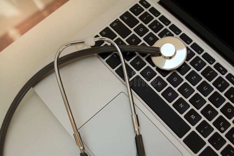 Medical Stethoscope on a Black Laptop Keyboard Stock Image - Image of ...
