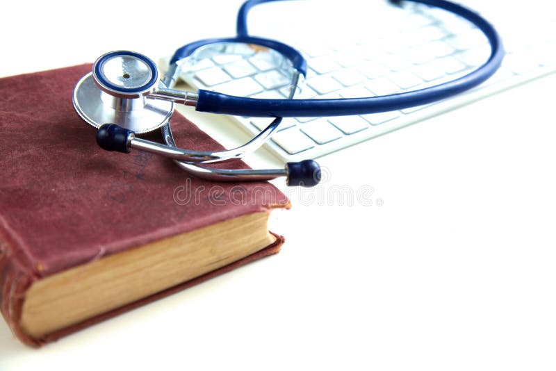 Medical Stethoscope with Books and Laptop on Table Stock Photo - Image ...