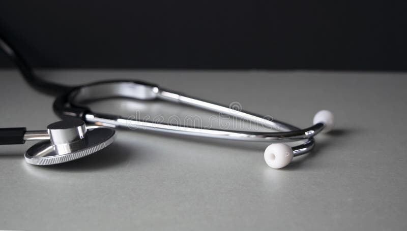 Medical Stethoscope And Clipboard With A Blank Sheet Of Paper Medical