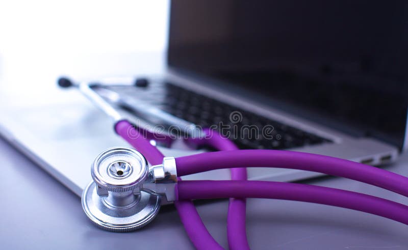 Medical Stethoscope with a Computer on the Desk Stock Image - Image of ...