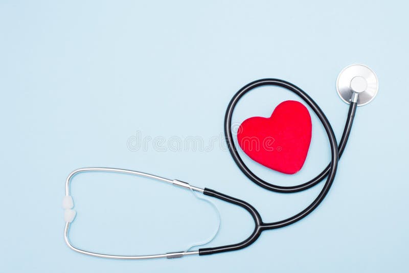 A Stethoscope on Blue Background with a Spring Flowers Stock Image ...