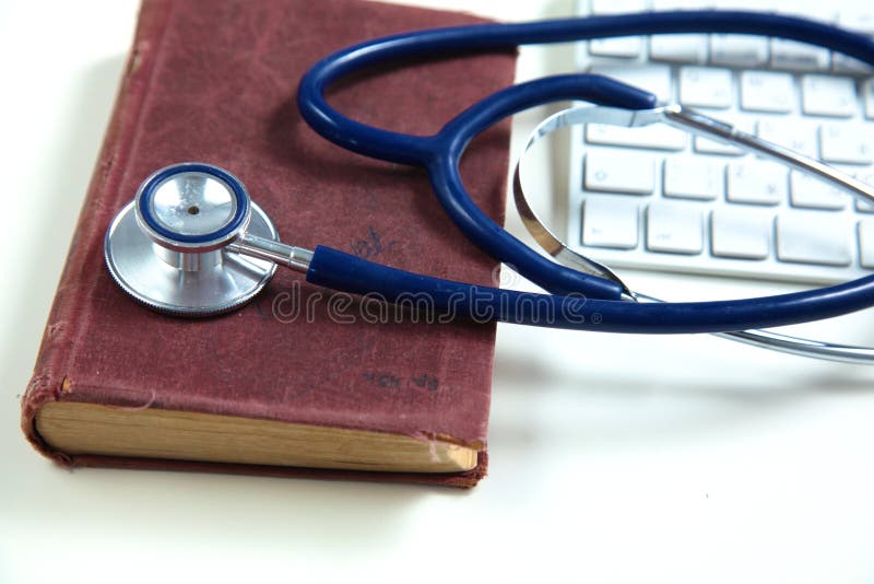 Medical Stethoscope with Old Books and Laptop on a Stock Image - Image ...