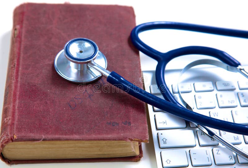 Medical Stethoscope with Old Books and Laptop on a Table Stock Photo ...