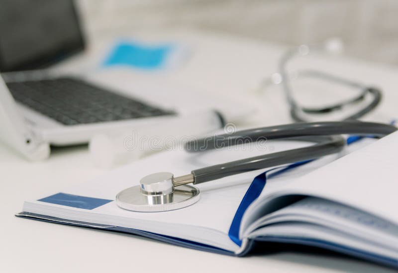 Medical Stethoscope Placed on the Doctors Table Stock Image - Image of ...