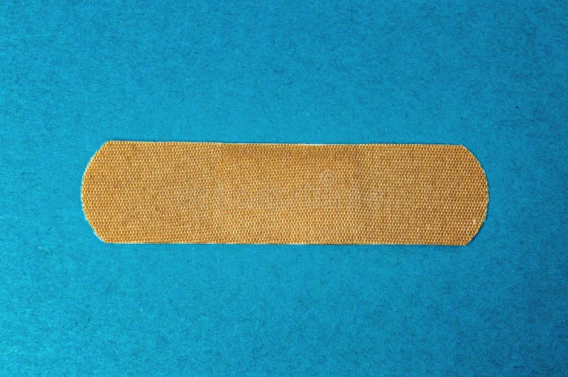 Medical Sticker, Patch of Textile on a Blue Background Close-up Stock ...