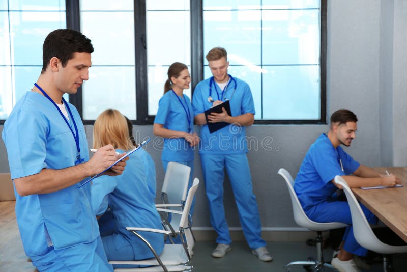 Medical Student with Groupmates Studying in University Stock Photo ...