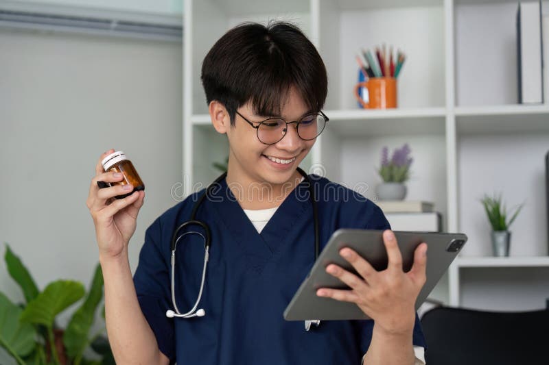Engagement and Learning. a Medical Student Smiling while Using a Tablet ...