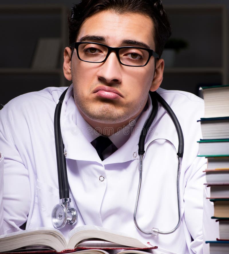 Medical Student Preparing for University Exams at Night Stock Image ...