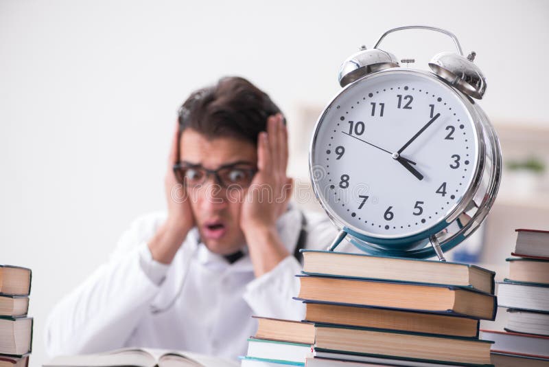 The Medical Student Running Out of Time for Exams Stock Photo - Image ...