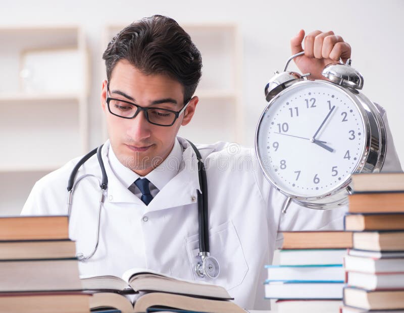 Medical Student Running Out of Time for Exams Stock Image - Image of ...