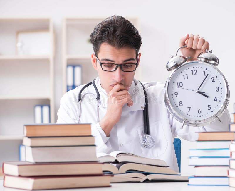 Medical Student Running Out of Time for Exams Stock Photo - Image of ...