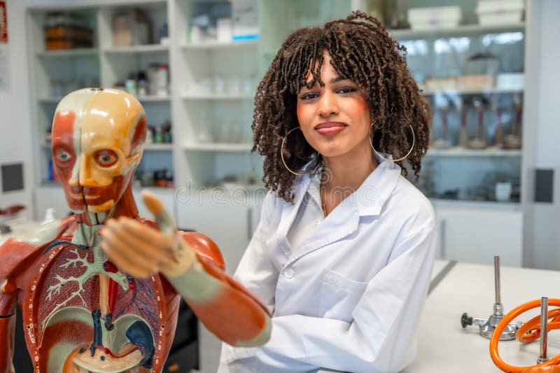 Medical Student Studying Human Anatomy with Anatomical Model in ...
