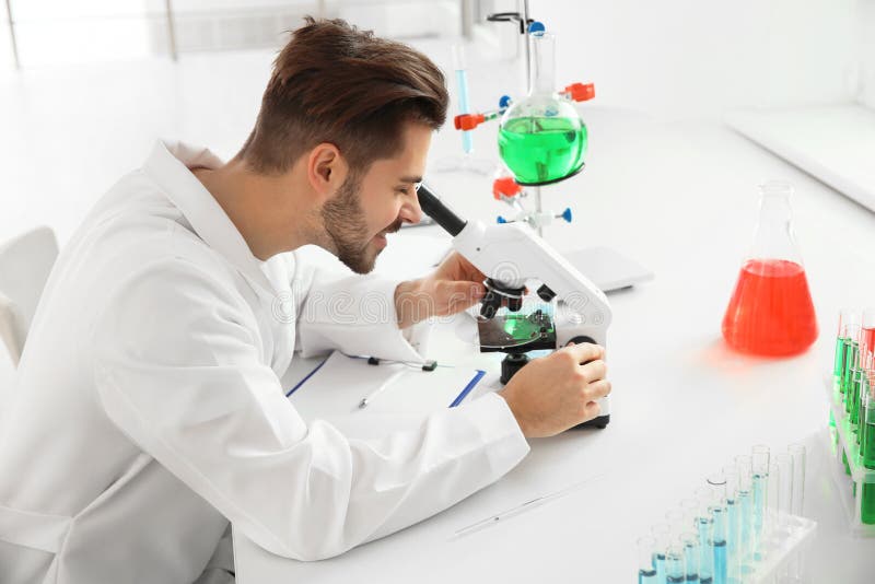 Medical Student Working with Microscope in Modern Laboratory Stock ...