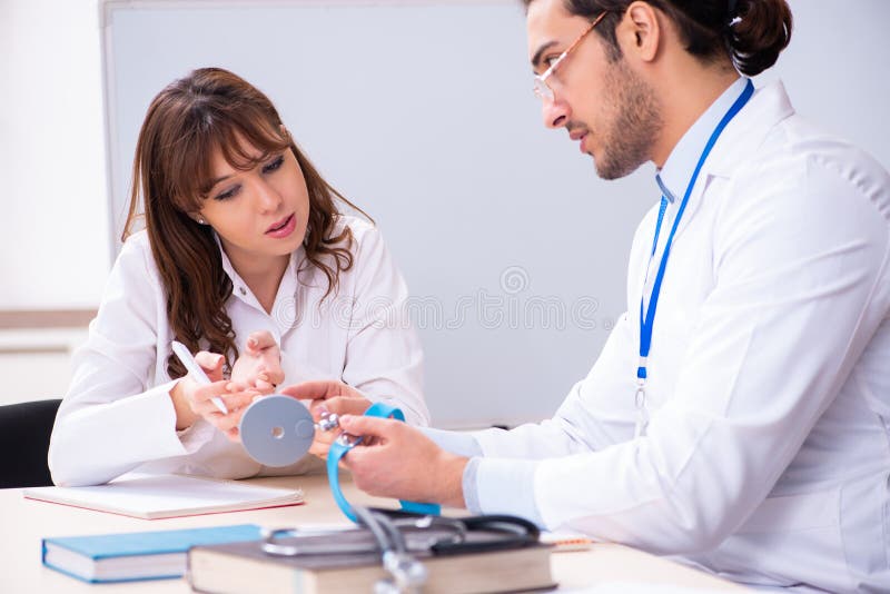 Medical Students in the Classroom Stock Photo - Image of doctor, mirror ...