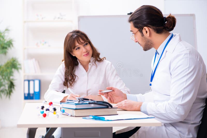 Medical Students in the Classroom Stock Image - Image of model, atom ...