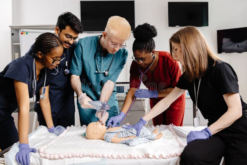 Medical Students Practicing Intubation Technique on Baby Mannequin during Training Stock Image ...