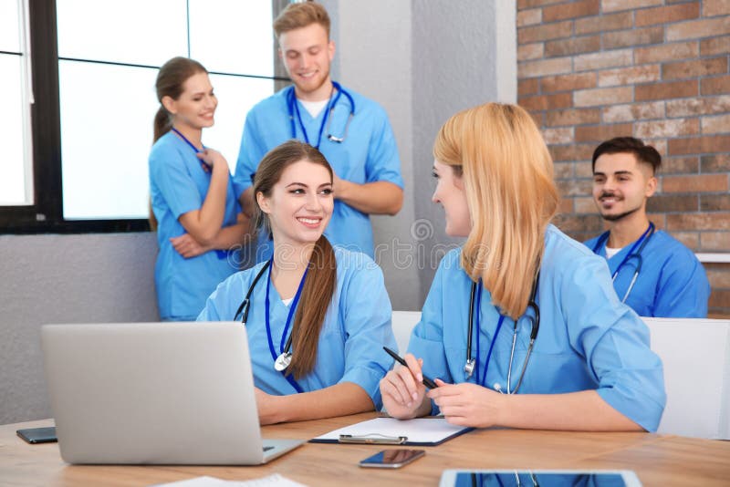 Medical Students in Uniforms Studying Stock Photo - Image of people ...