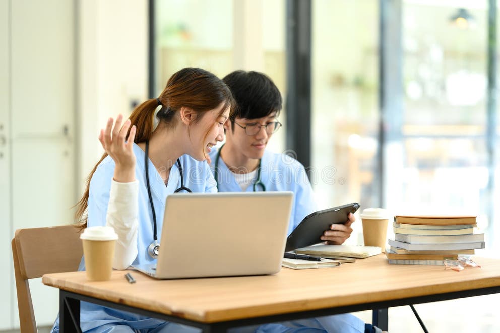Medical Students Working Together on Assignments in a Modern Study Space. Stock Image - Image of ...