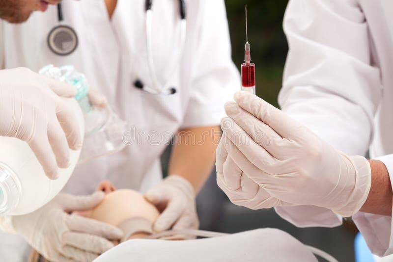 Medical Team Adjusting Tube in Dummy Patient S Stock Image - Image of ...