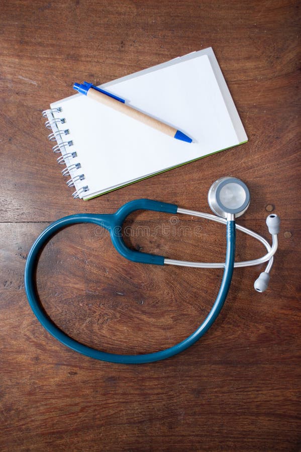 Medical Stuff in a Wooden Table Stock Image - Image of list, instrument ...