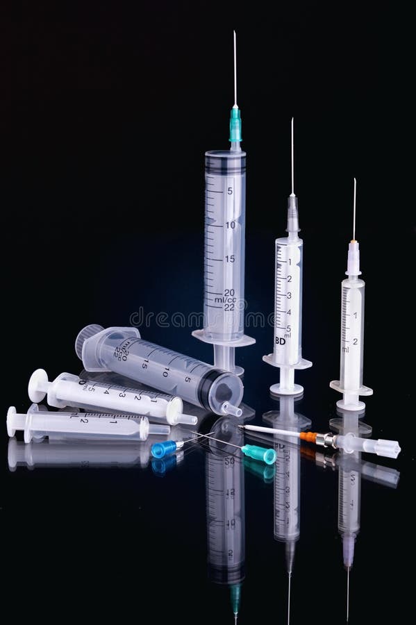 Medicine vial and syringe stock photo. Image of liquid - 13371904