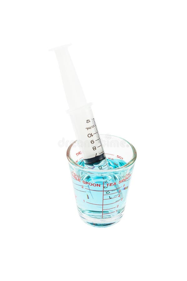 Medical Syringe And Measuring Cup With Blue Liquid Stock Photo - Image ...