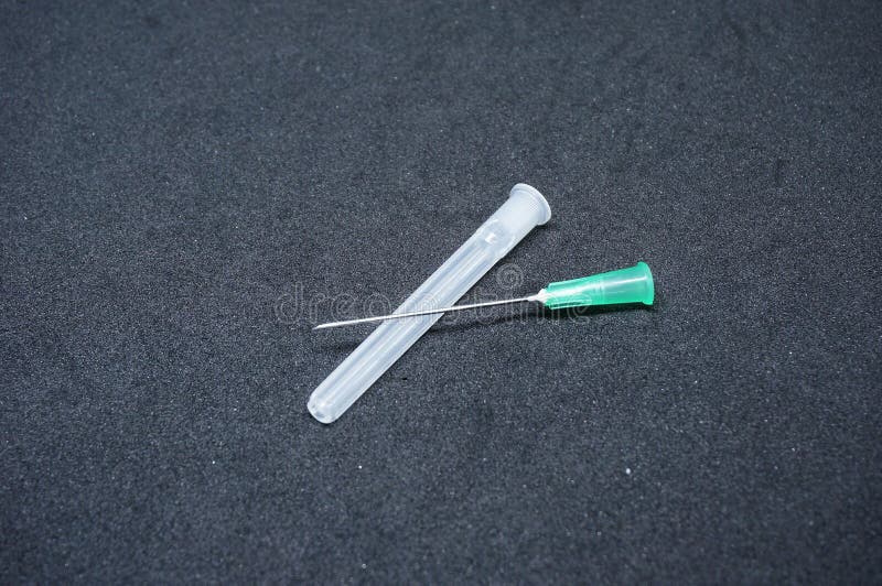 Medical syringe needle stock photo. Image of illness - 87516116