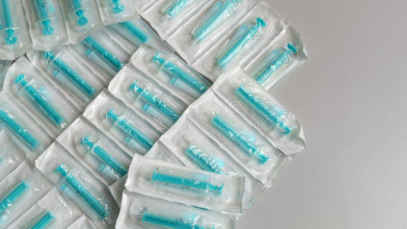 Medical Syringes in a Package. a Bunch of Unused, Packaged Syringes ...