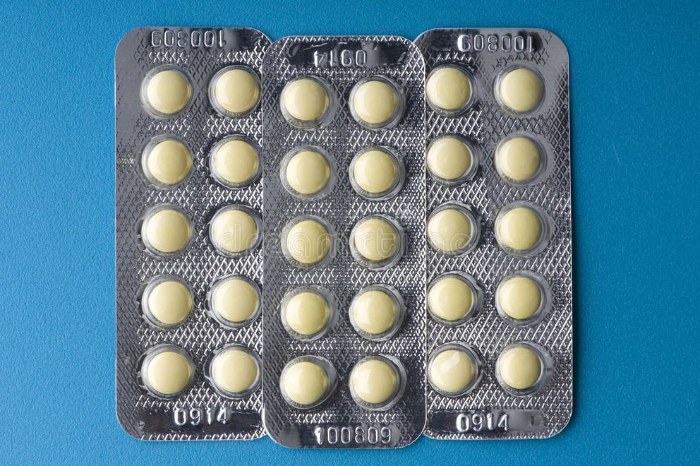 Medical Tablet on Blue Macro Stock Image - Image of pain, healthy: 12326647