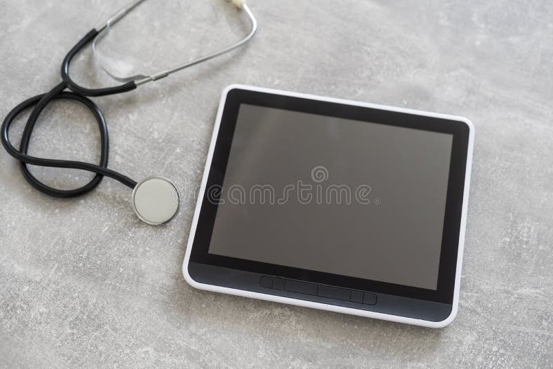 Medical Tablet with Screen Empty Screen on Wooden Table Stock Image ...