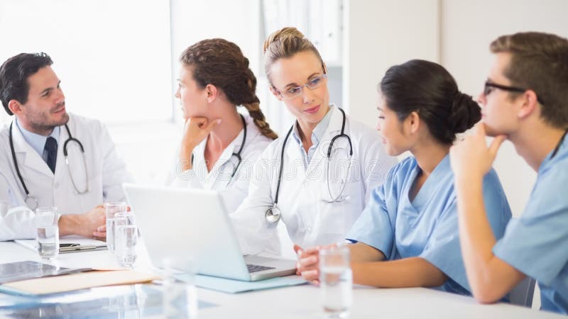 Medical team discussing stock image. Image of service - 37816333