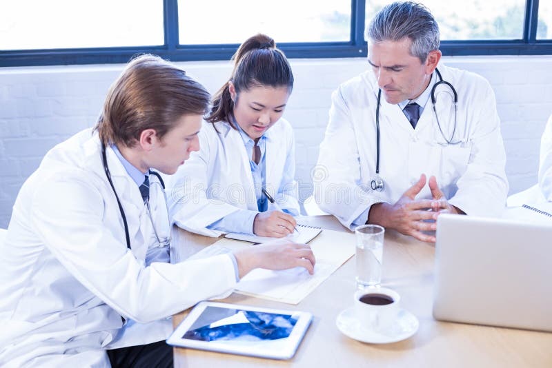 Medical Team Discussing in Meeting Stock Photo - Image of employees ...
