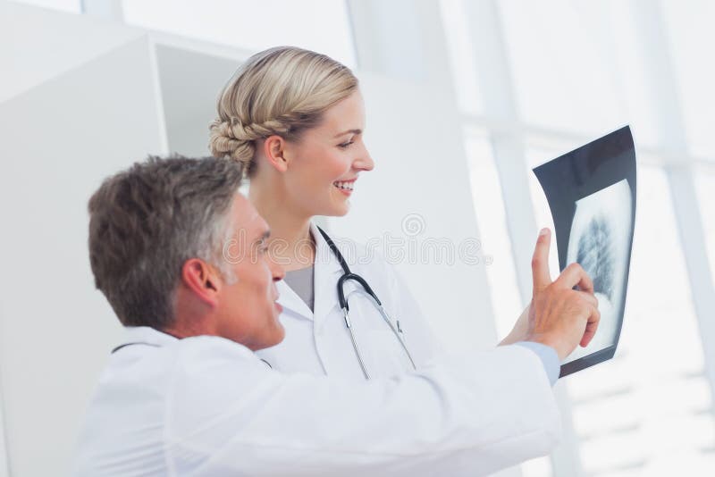 Medical Team Examining a Radiography Stock Image - Image of hospital ...