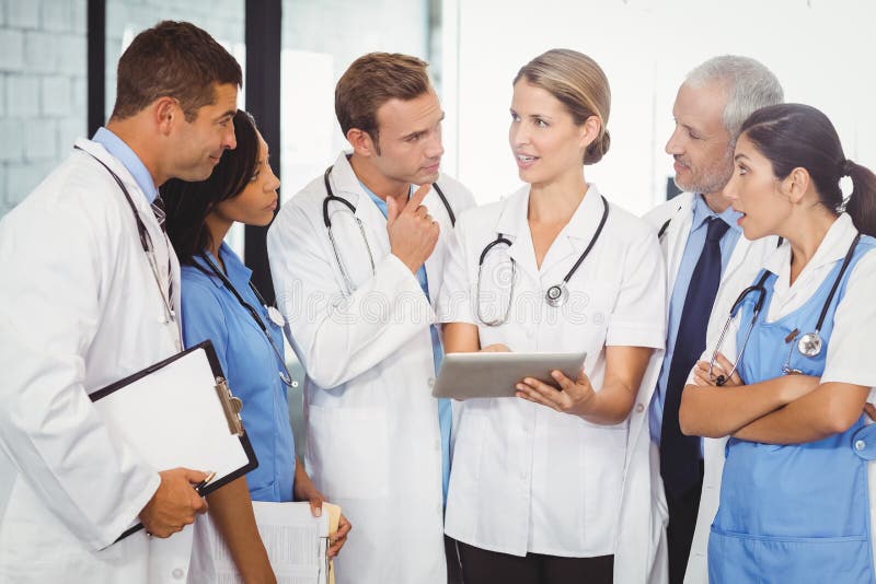 Medical Team Interacting with Each Other Stock Image - Image of ...