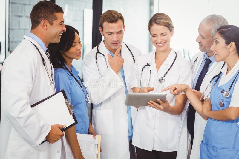 Medical Team Interacting and Using Digital Tablet Stock Image - Image ...